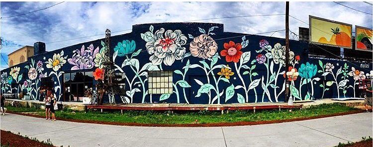 See How Flower Murals Can Transform Any Gray Building - PlayJunkie