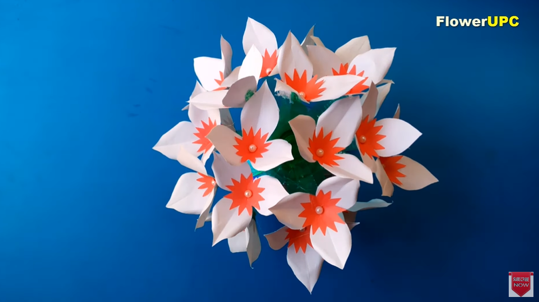 Girl Makes Beautiful Paper Flower Decorations - PlayJunkie