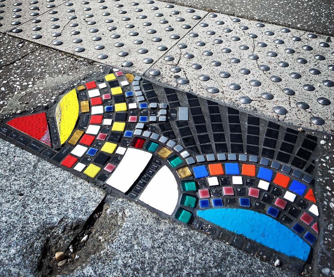 Anonymous Artist Is Transforming Potholes and Wall Cracks into Works of ...